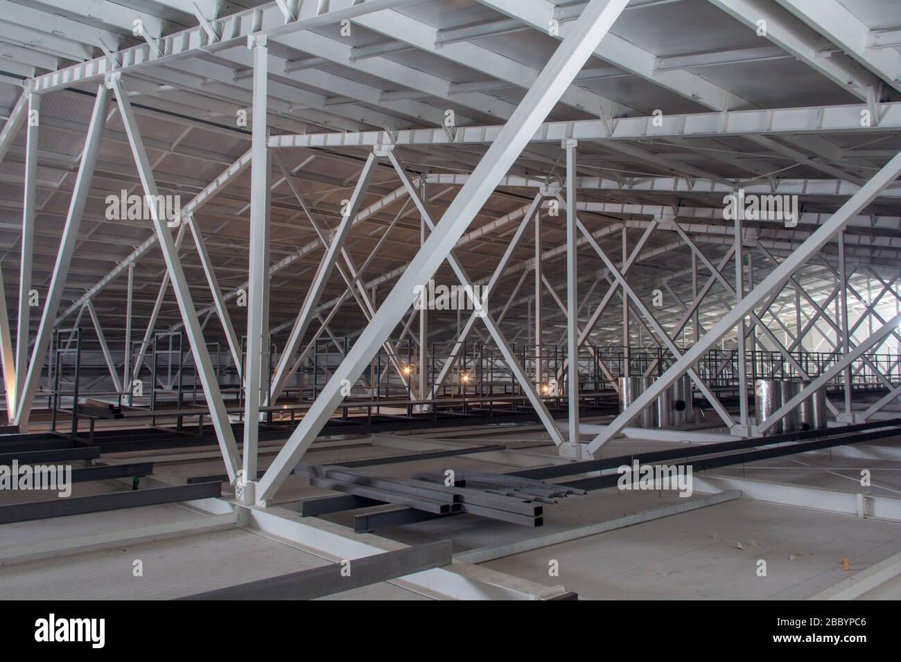 Steel beam of the new hangar roof structure. Steel frame construction ...
