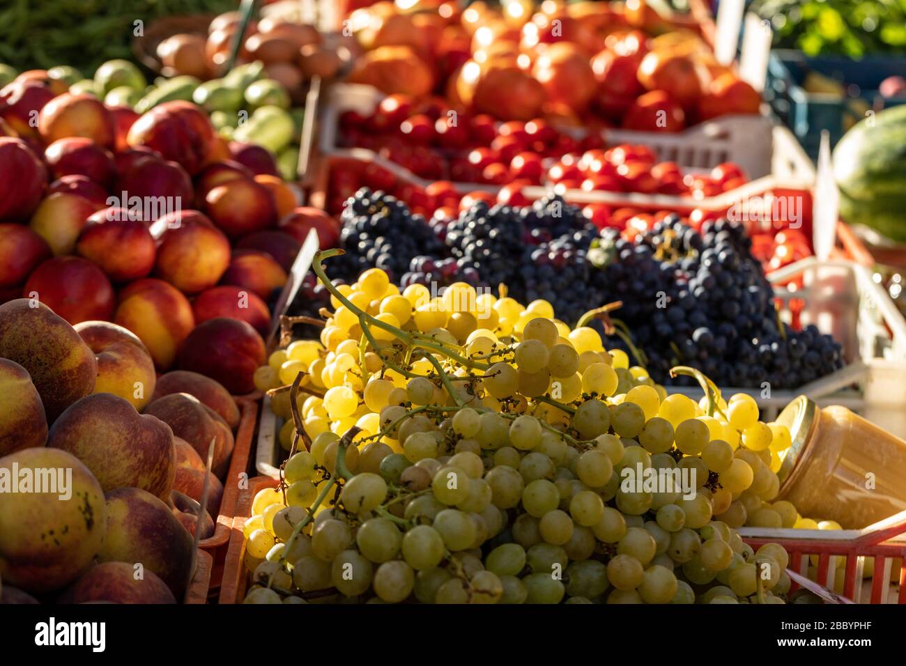 Fresh fruits and vegetables at a farmers market in Italy Stock Photo ...