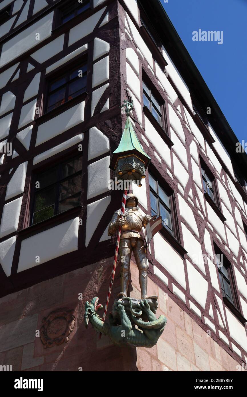 Medieval Nuremberg, Germany. 500 year old statue of Saint George the ...