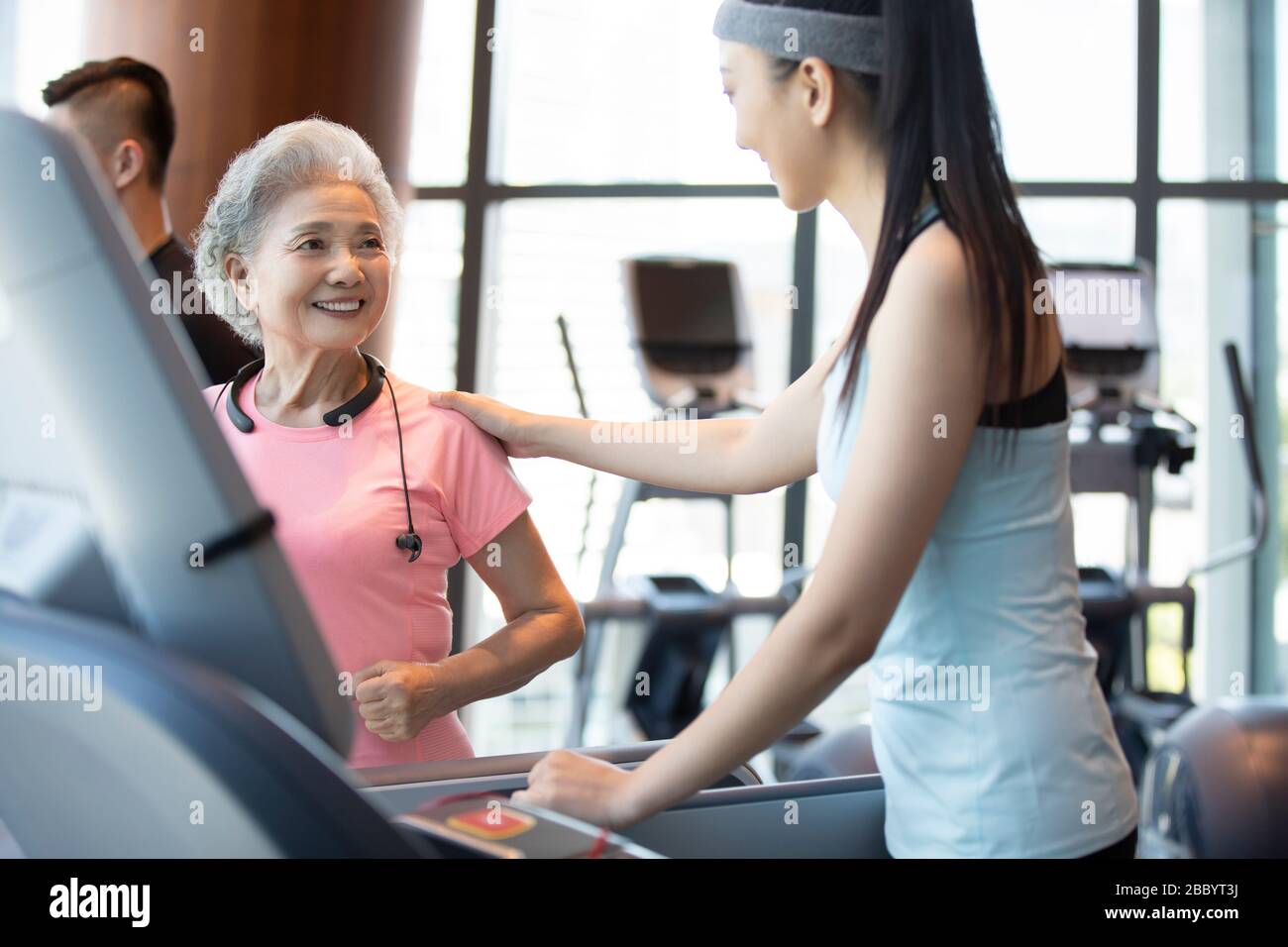 Senior chinese woman running hi-res stock photography and images - Alamy