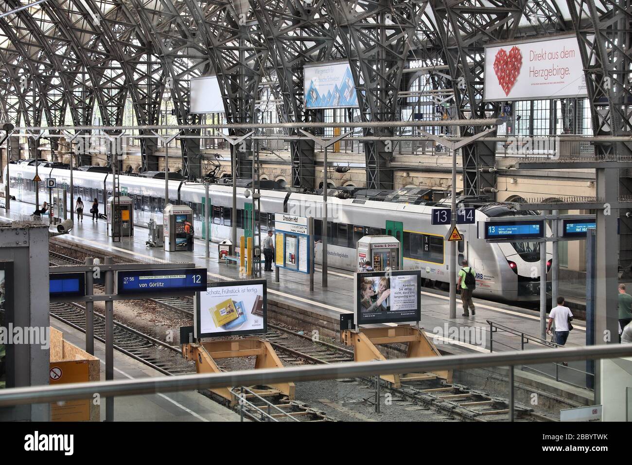 DRESDEN, GERMANY - MAY 10, 2018: People wait for a train at Dresden ...
