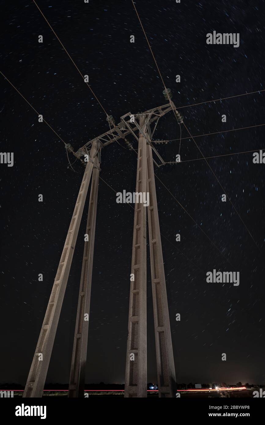 Electric pole at night in the fields of Guadalajara Stock Photo - Alamy
