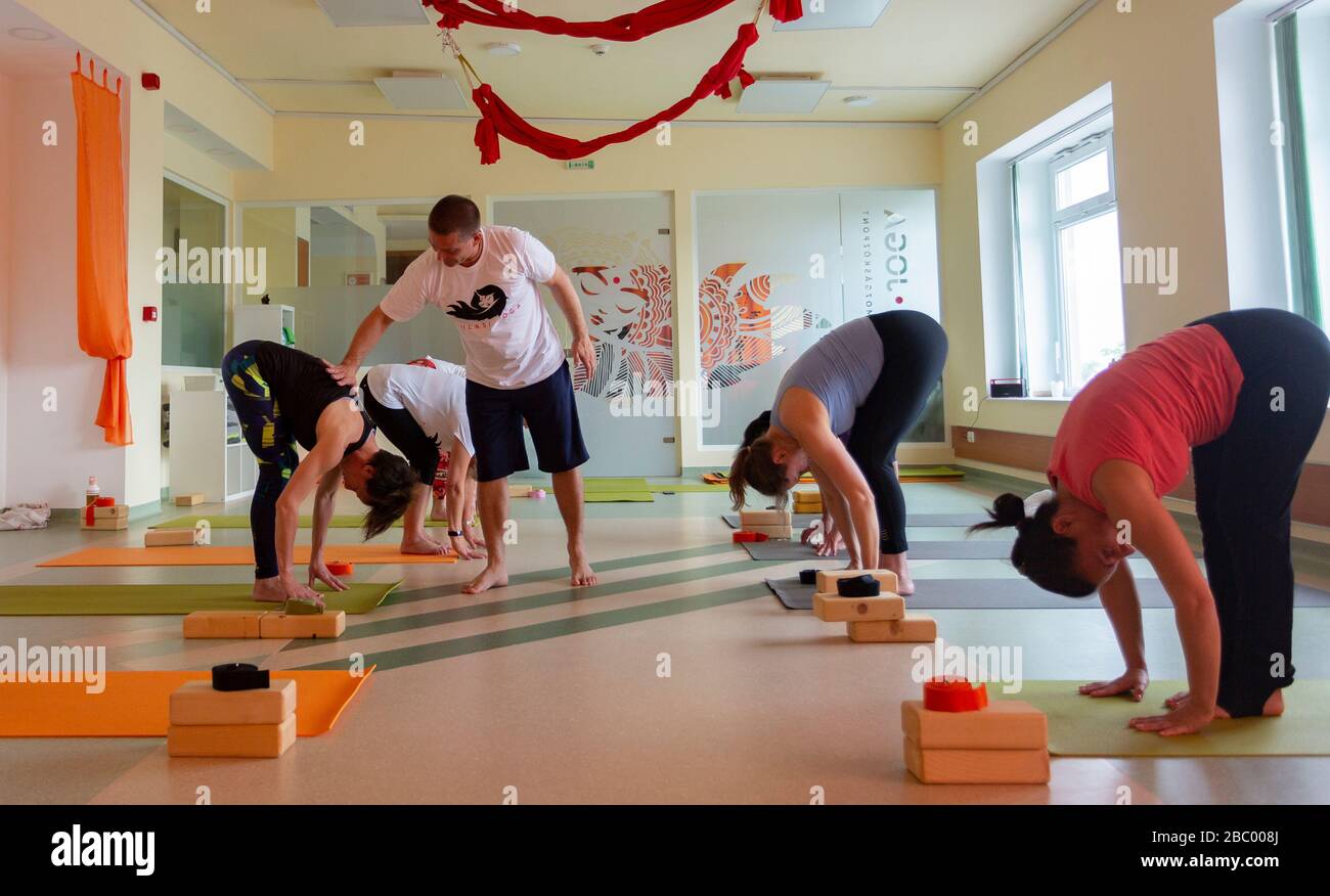 Yoga class in progress Stock Photo - Alamy