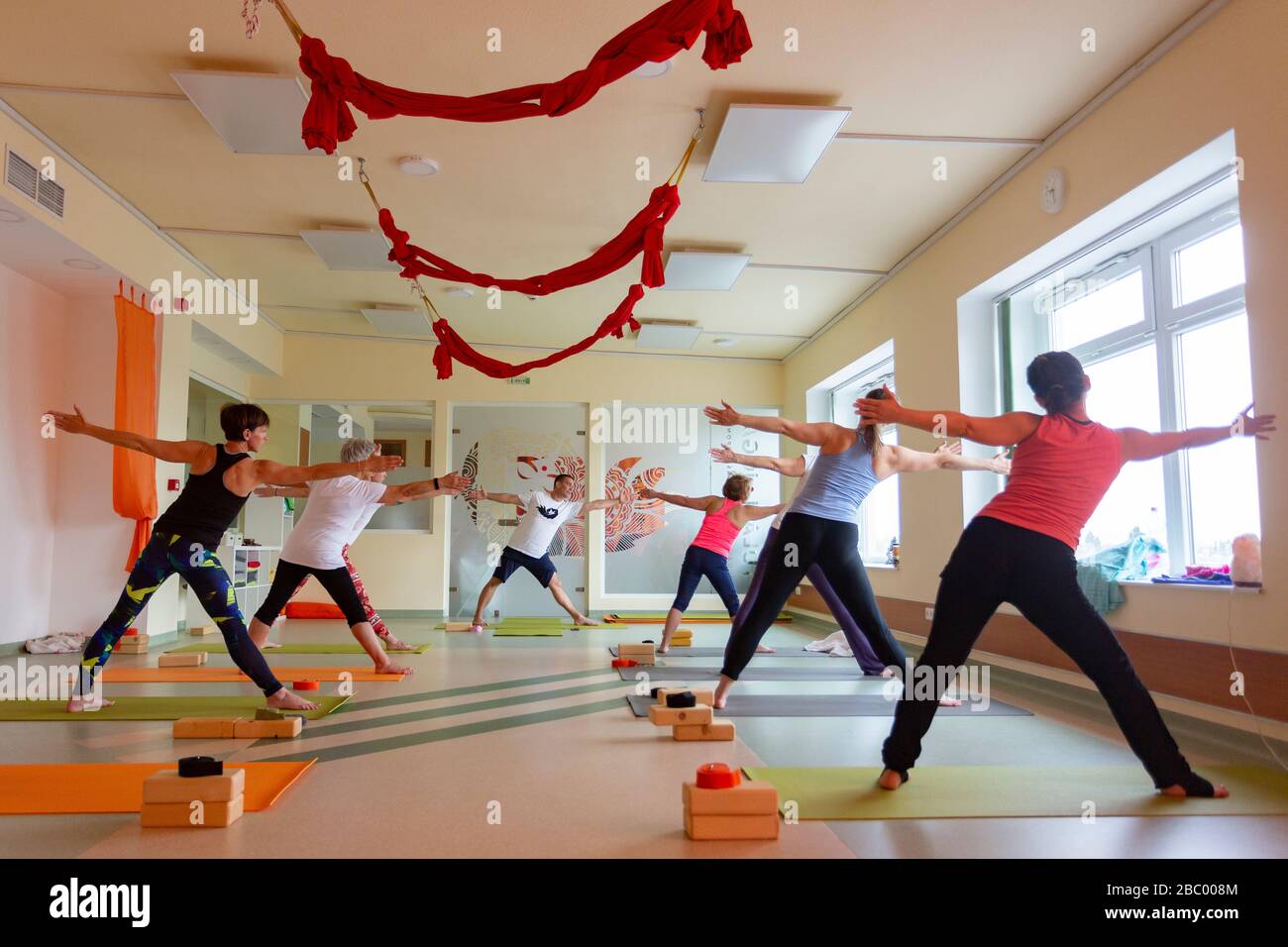 Yoga class in progress Stock Photo - Alamy