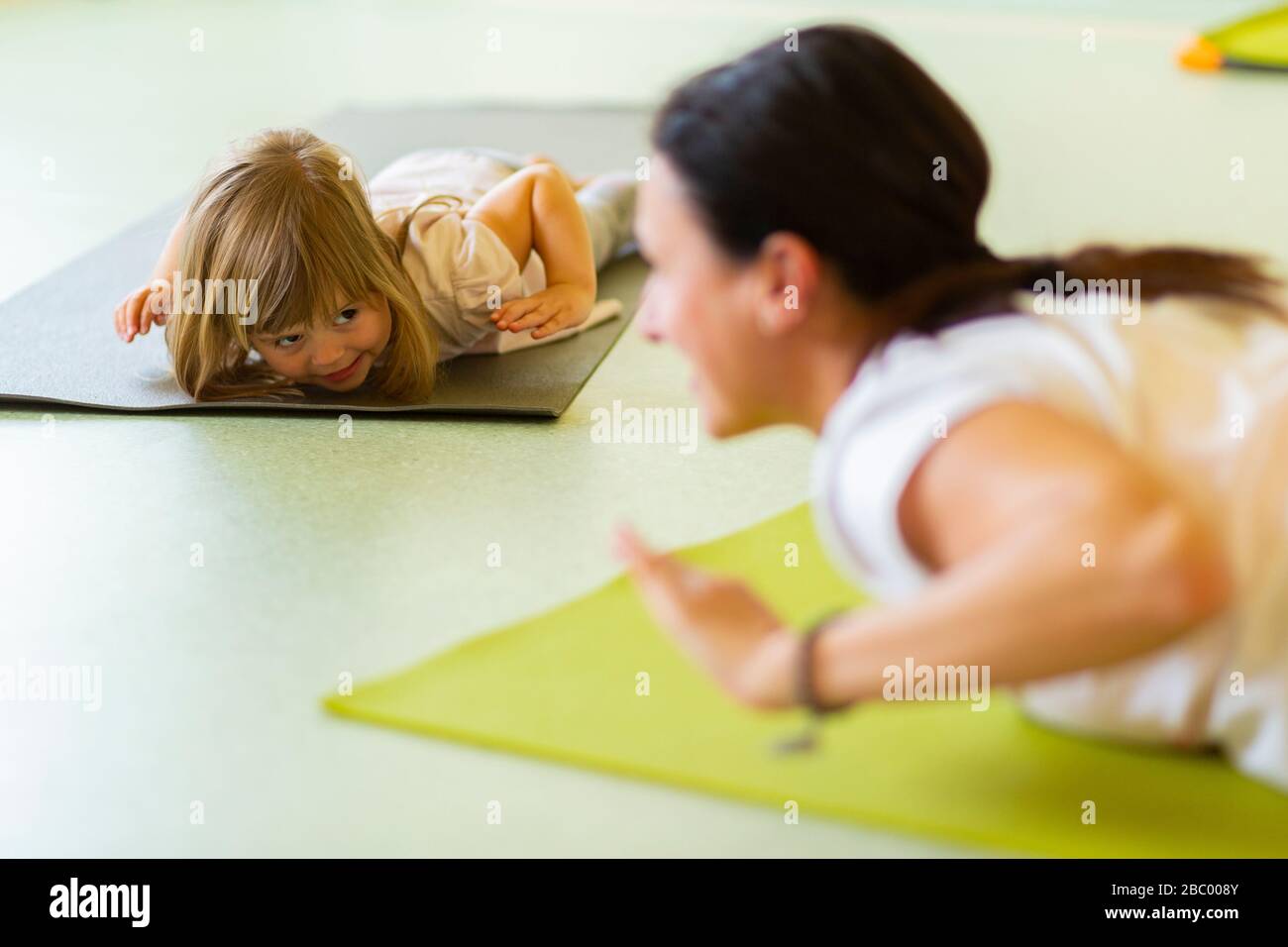 Child yoga class in progress Stock Photo - Alamy