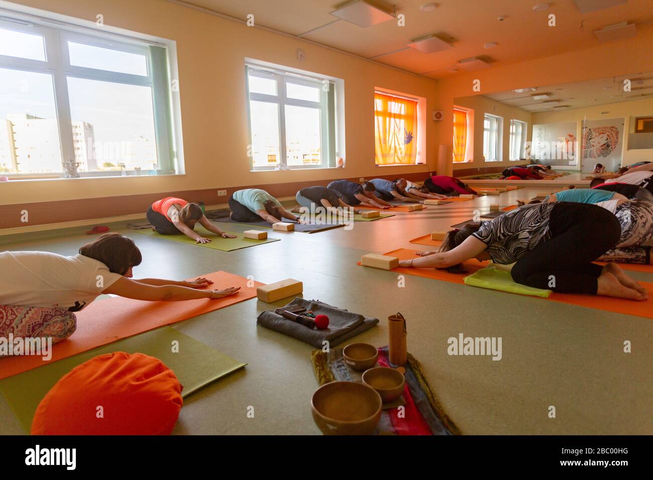 Aerial yoga class in progress Stock Photo - Alamy