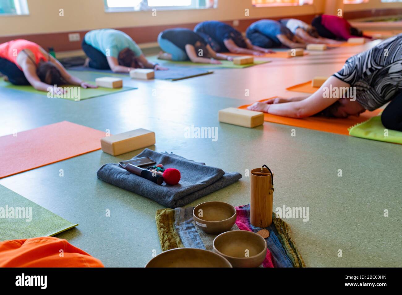 Yoga class in progress Stock Photo - Alamy