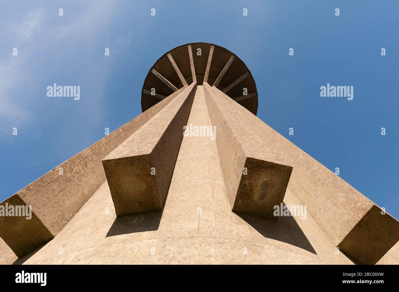 Massive concrete water tower at top of Vigo Village towering above ...