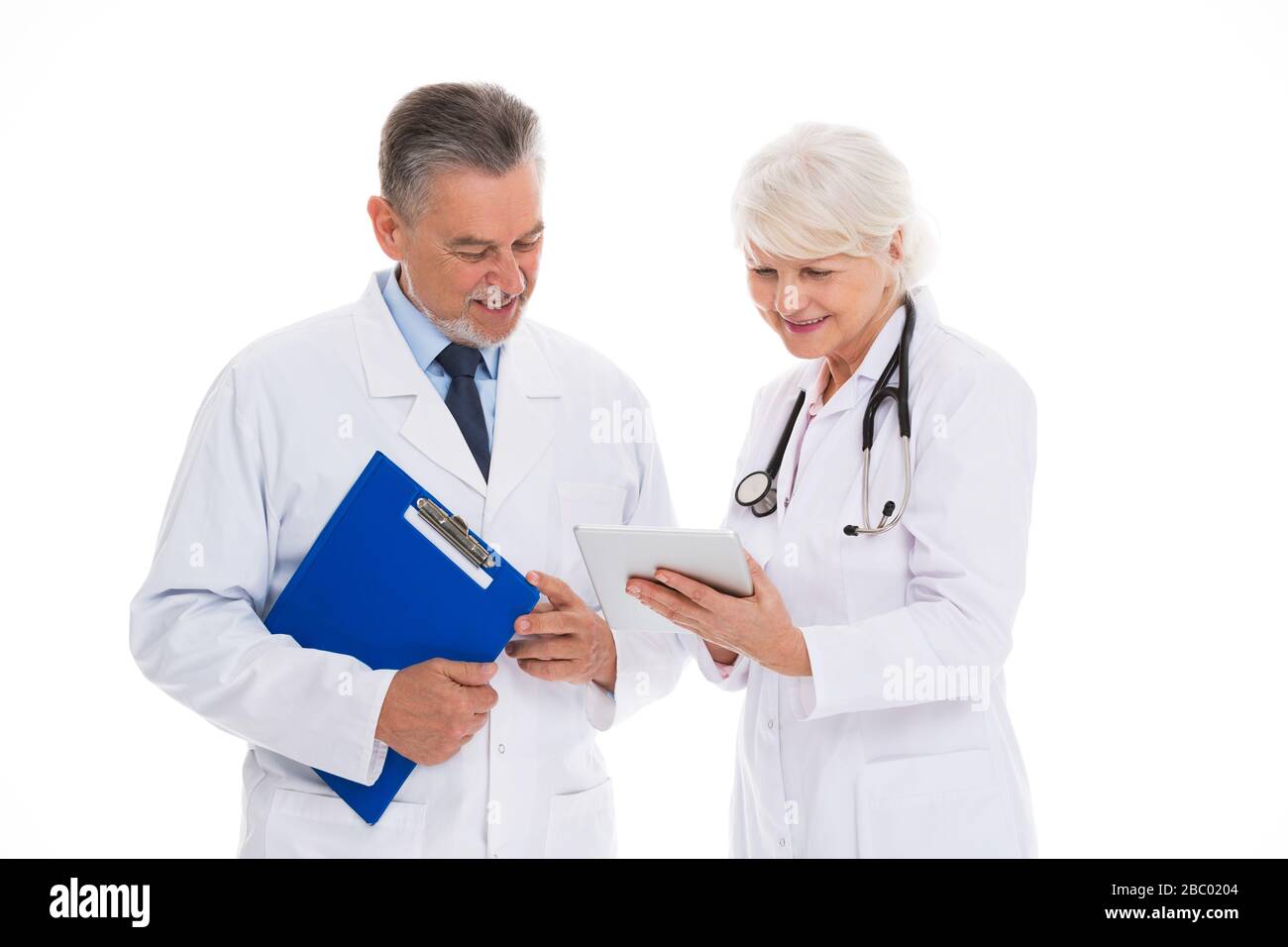 Two smiling female work Cut Out Stock Images & Pictures - Alamy