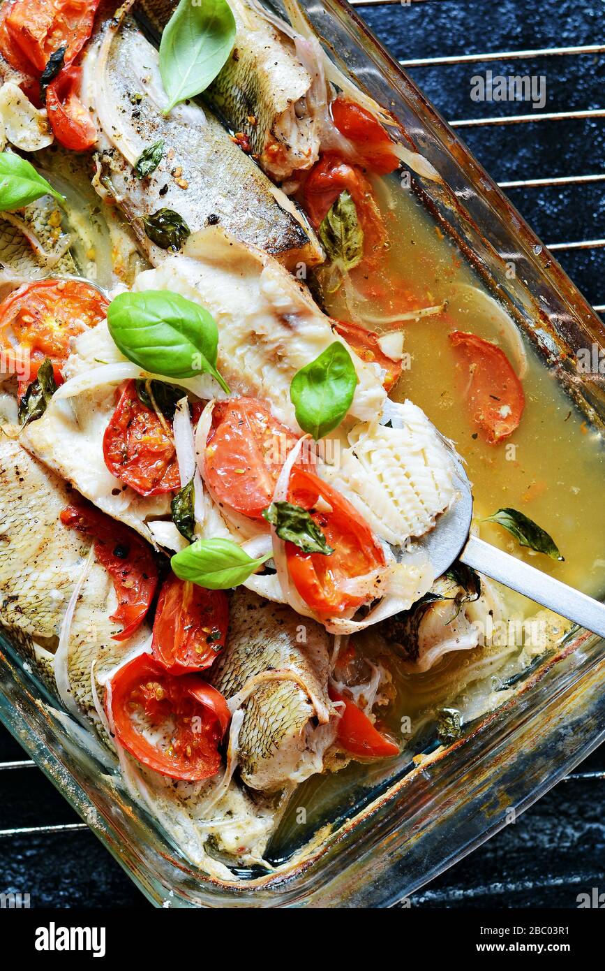 White fish (pollock, cod, hake) baked with tomatoes, Italian herbs and ...