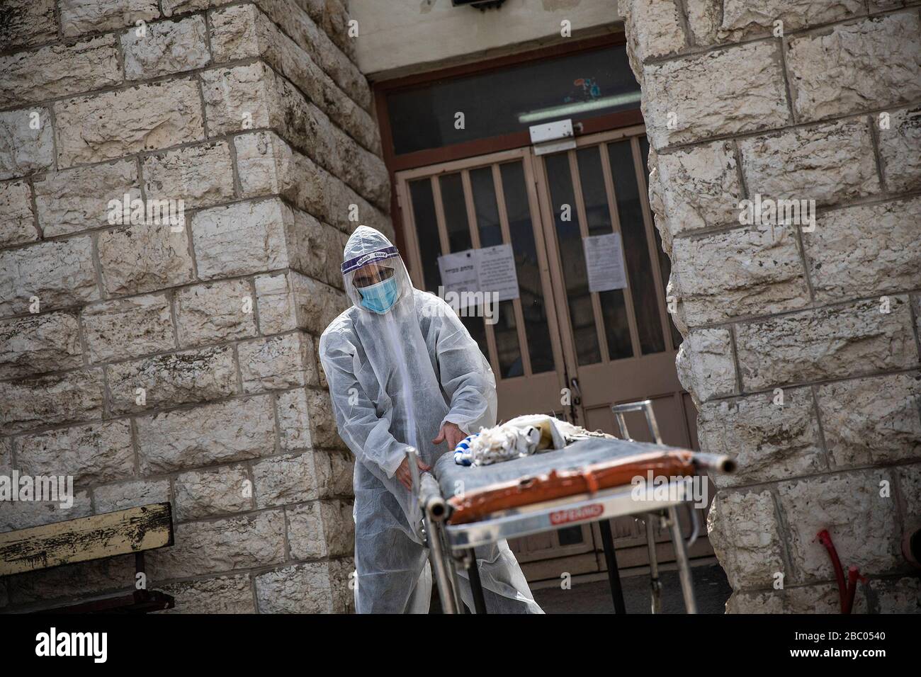 Jerusalem, Israel. 02nd Apr, 2020. A member of the Hevrat Kadisha, a ...
