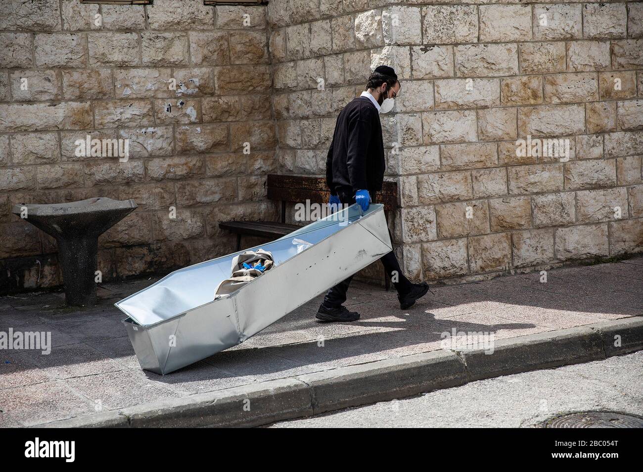 Jerusalem, Israel. 02nd Apr, 2020. A member of the Hevrat Kadisha, a ...