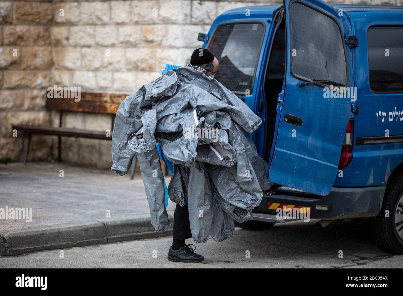 Jerusalem, Israel. 02nd Apr, 2020. A member of the Hevrat Kadisha, a ...