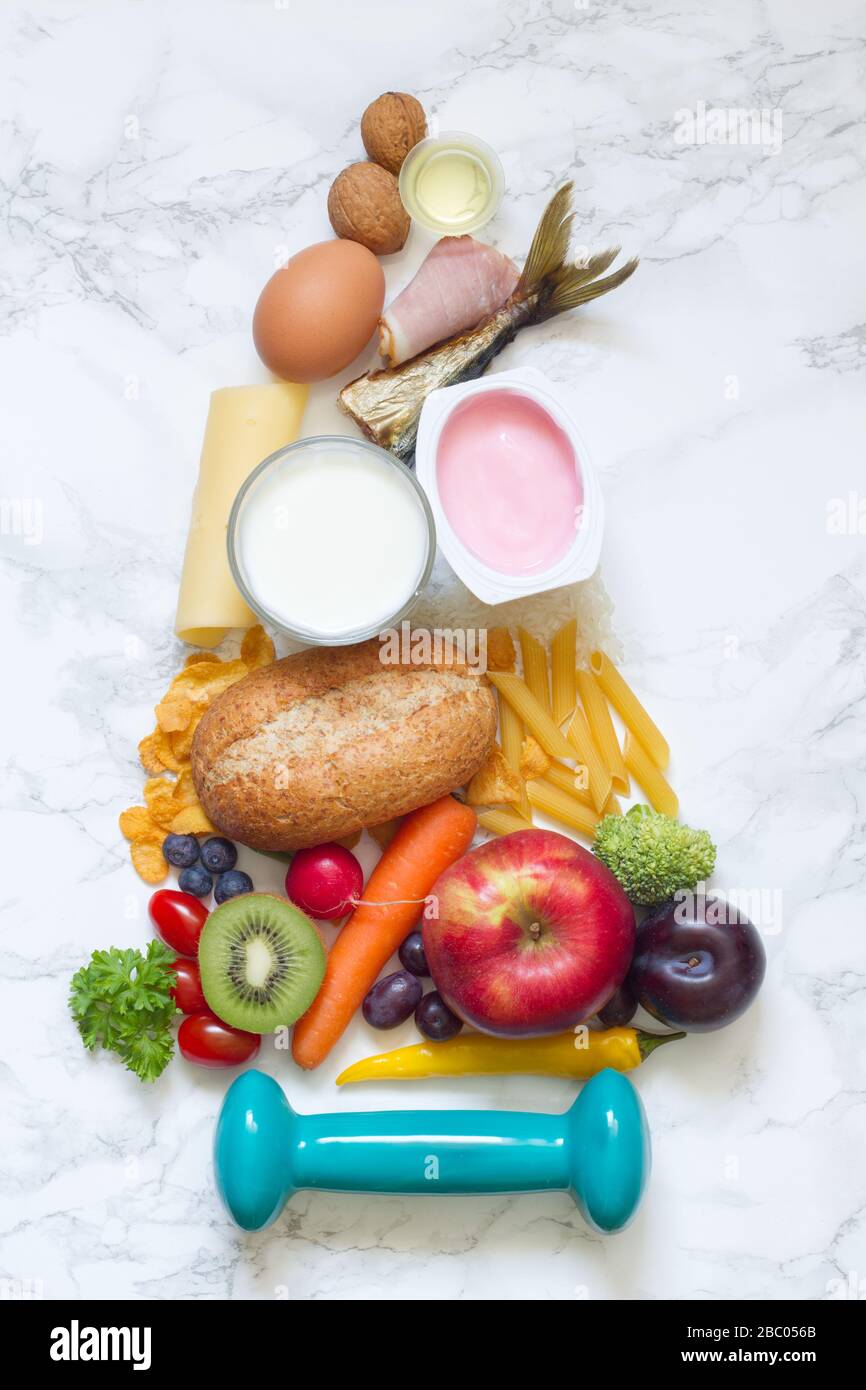 Healthy eating pyramid diet nutrition concept and sport Stock Photo - Alamy