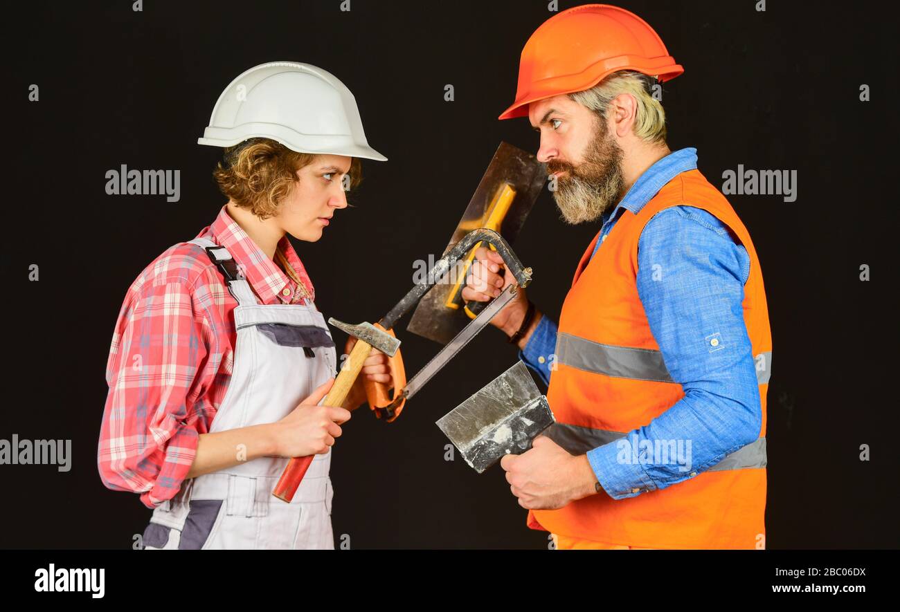 Couple renovating house. Gender equality. Construction site. Quality ...