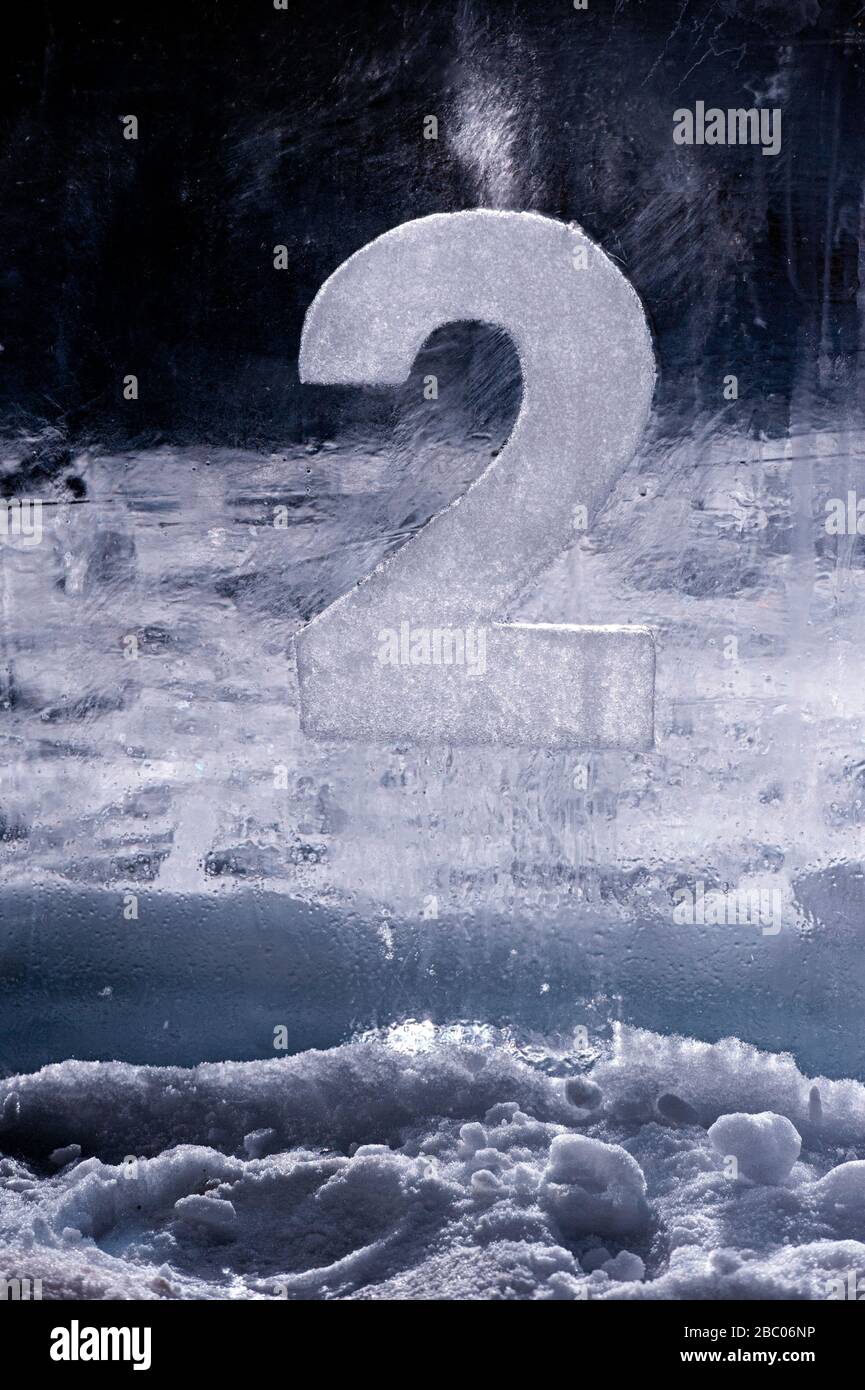 The number two carved into a block of ice Stock Photo - Alamy