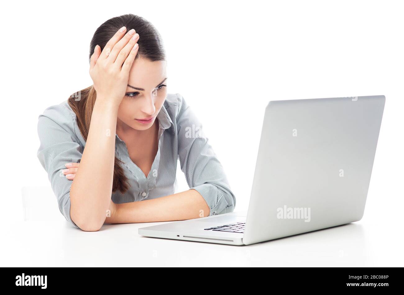 Young woman using laptop sad hi-res stock photography and images - Alamy
