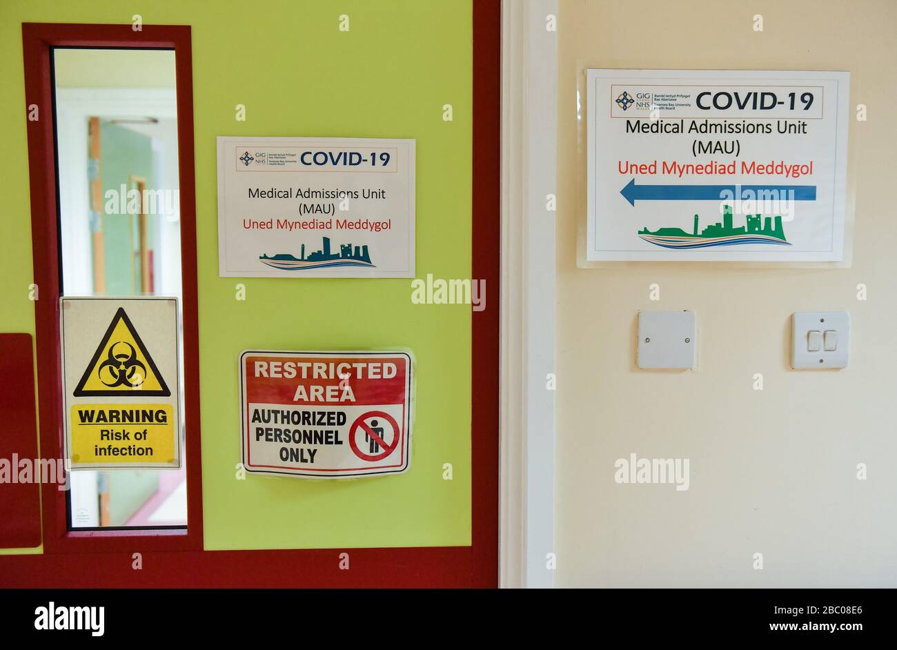 Signage on the Covid-19 ward at the Neath Port Talbot Hospital, in ...