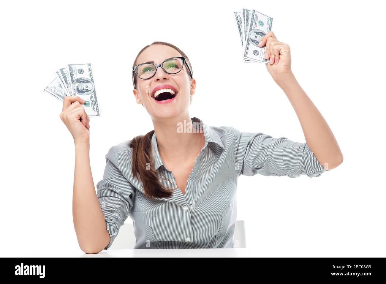Rich excited woman cash money hi-res stock photography and images - Alamy