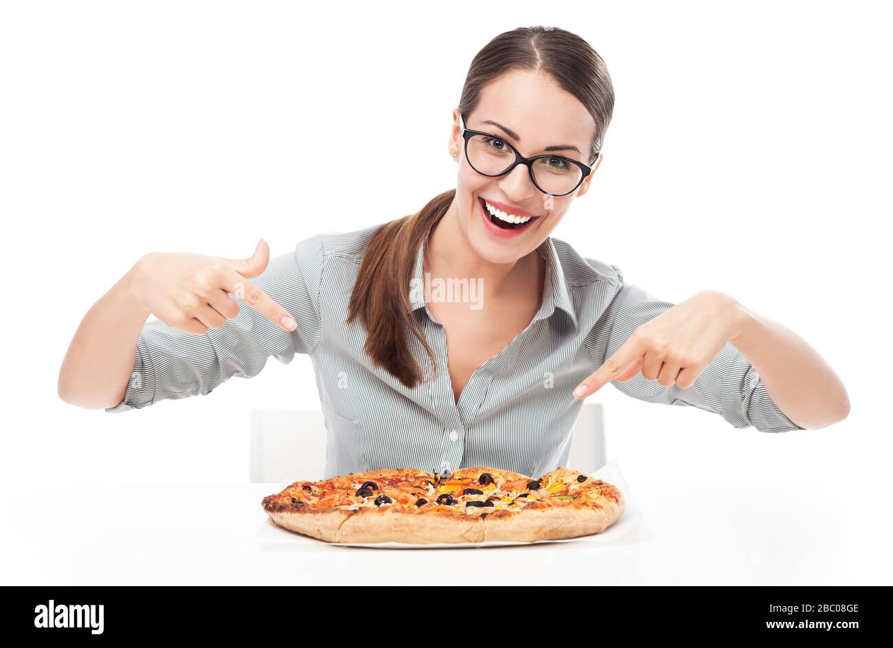 Beautiful attractive woman eating pizza hi-res stock photography and ...