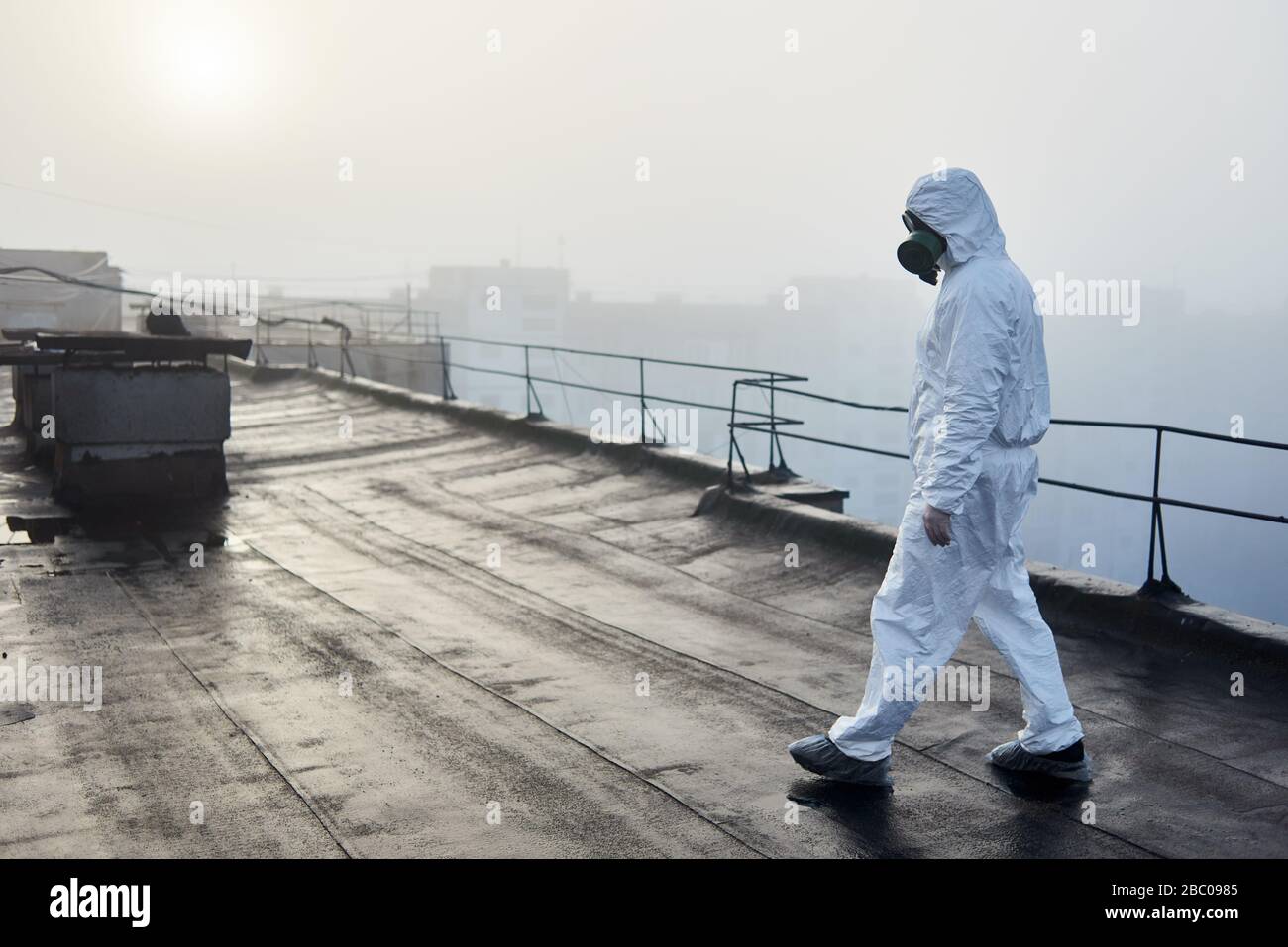 Scientist wearing white coverall hi-res stock photography and images ...
