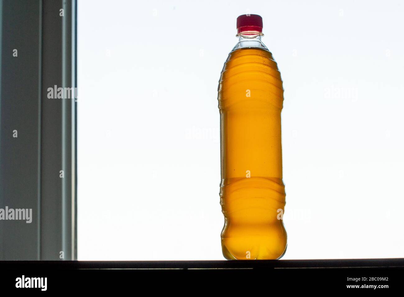 Bottle of cooking oil isolated on white background Stock Photo - Alamy