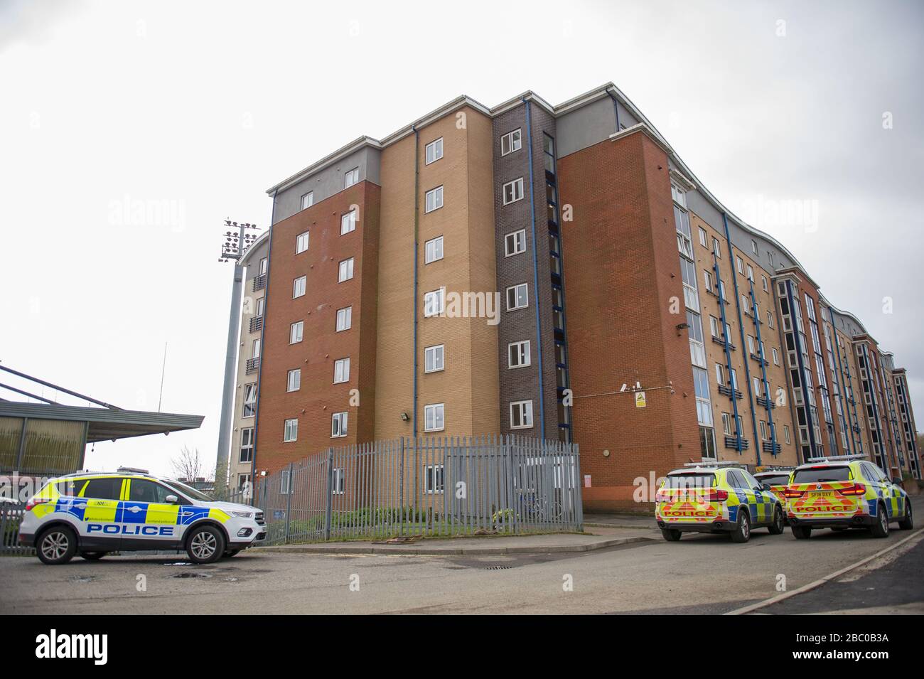 Police emergency patrol cars attend incident at flats hi-res stock ...