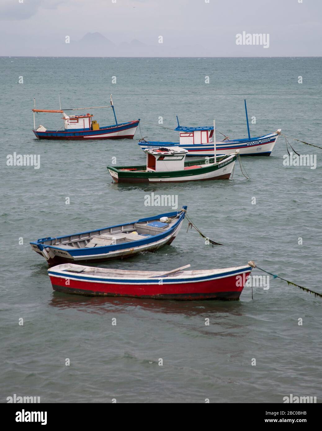 A view of small fishing boats in the bay at the resort of Buzios in the ...