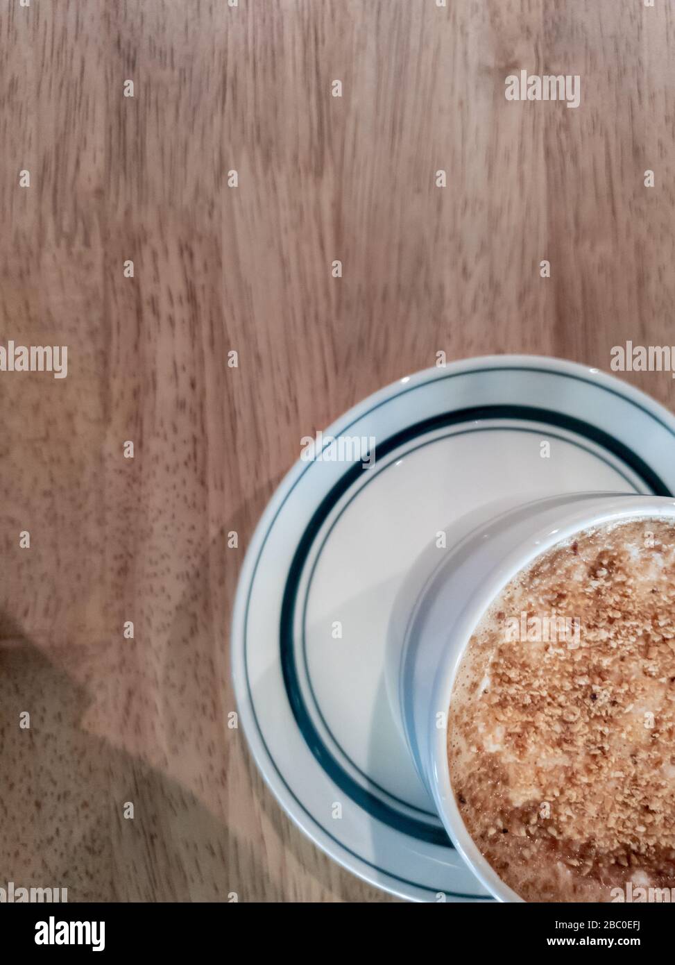 a topview of delicious cafe latte coffee topping with peanuts Stock ...