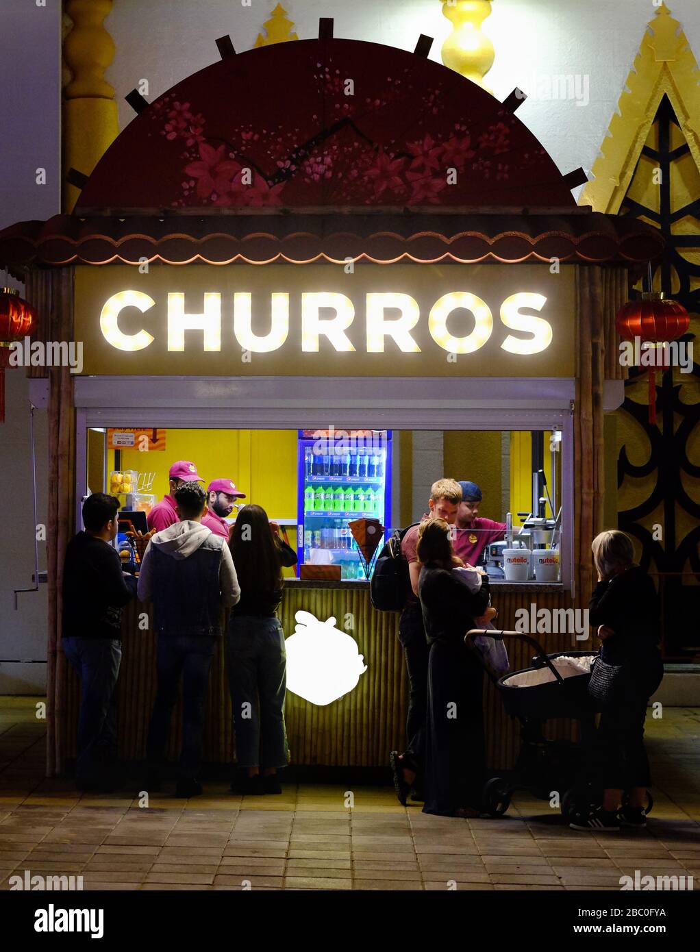 Churros take-away kiosk at Global Village, Dubai, UAE. Global Village ...