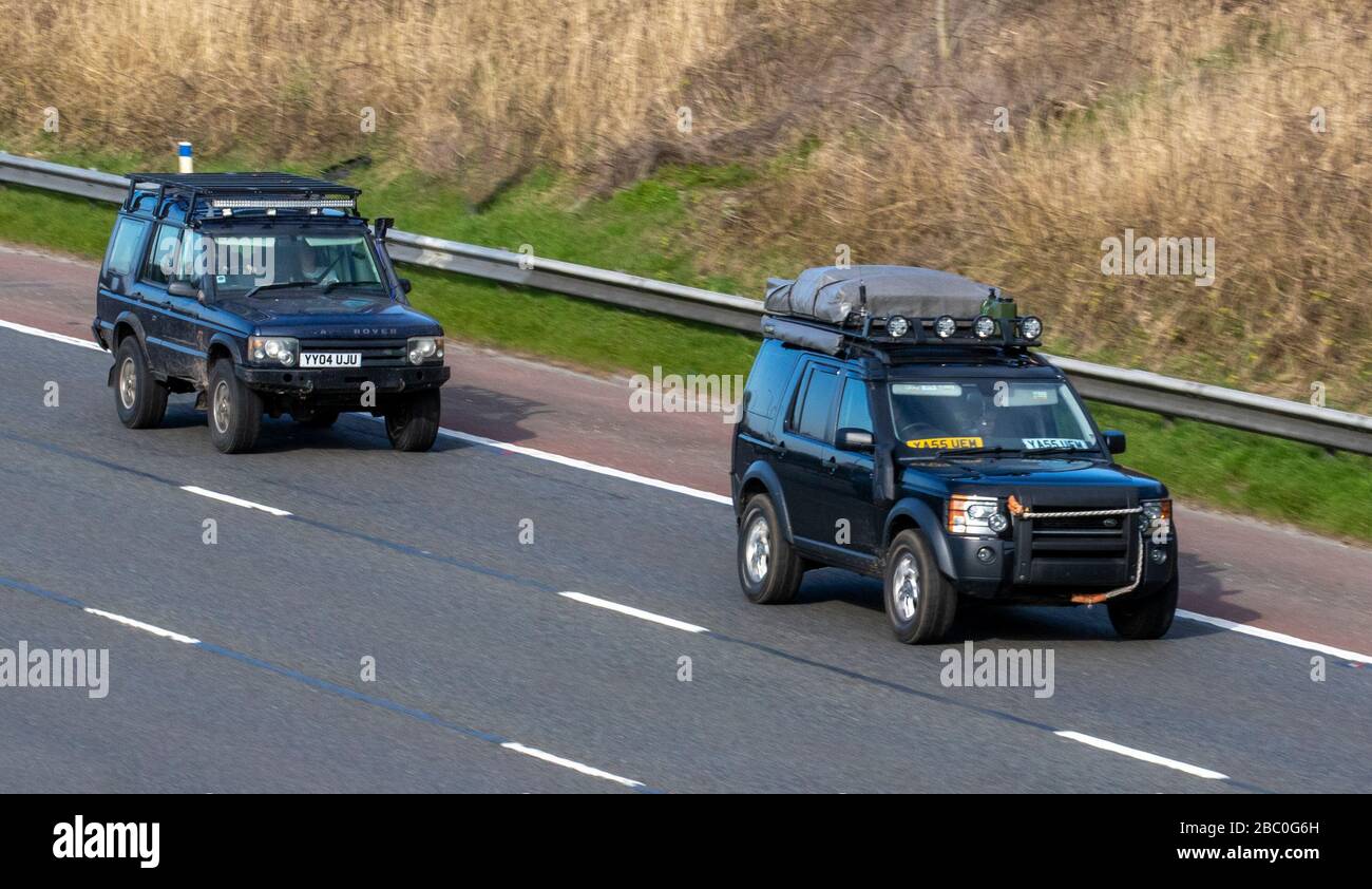 Two Land Rover cars with expedition equipment; Vintage expedition ...