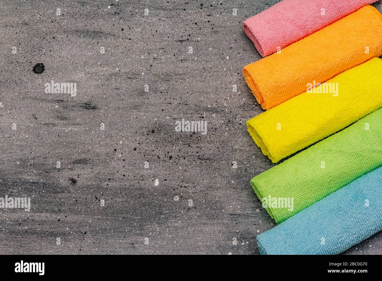 Set of colorful dusters. House cleaning product, home disinfection in ...