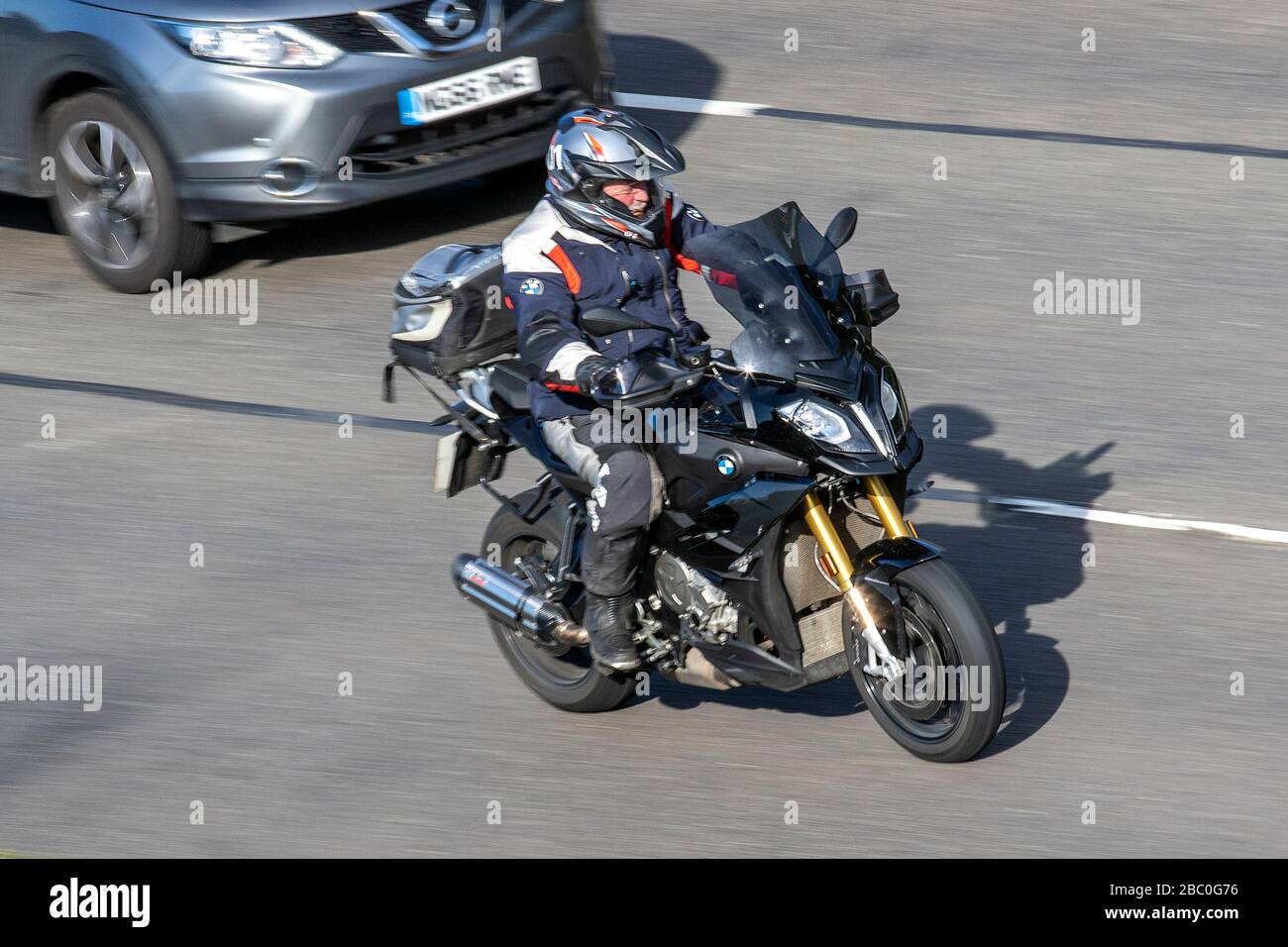 2019 BMW Motorbike rider overtaking; two wheeled transport, motorcycles ...