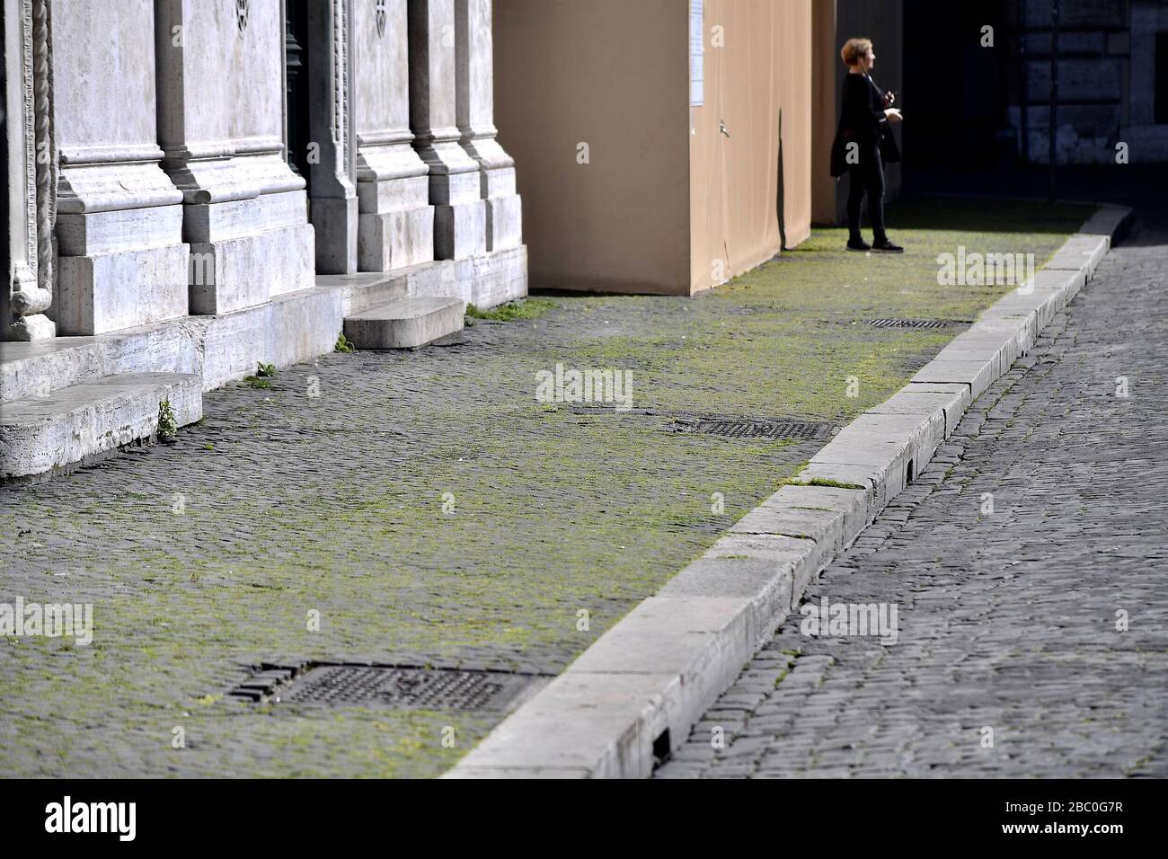 Rome, Piazza Navona looks like a green lawn, the grass grows among the ...