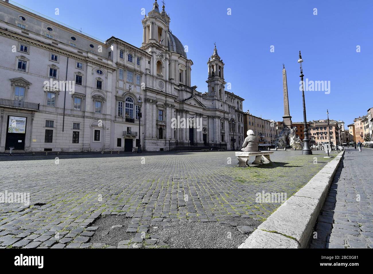 Rome, Piazza Navona looks like a green lawn, the grass grows among the ...