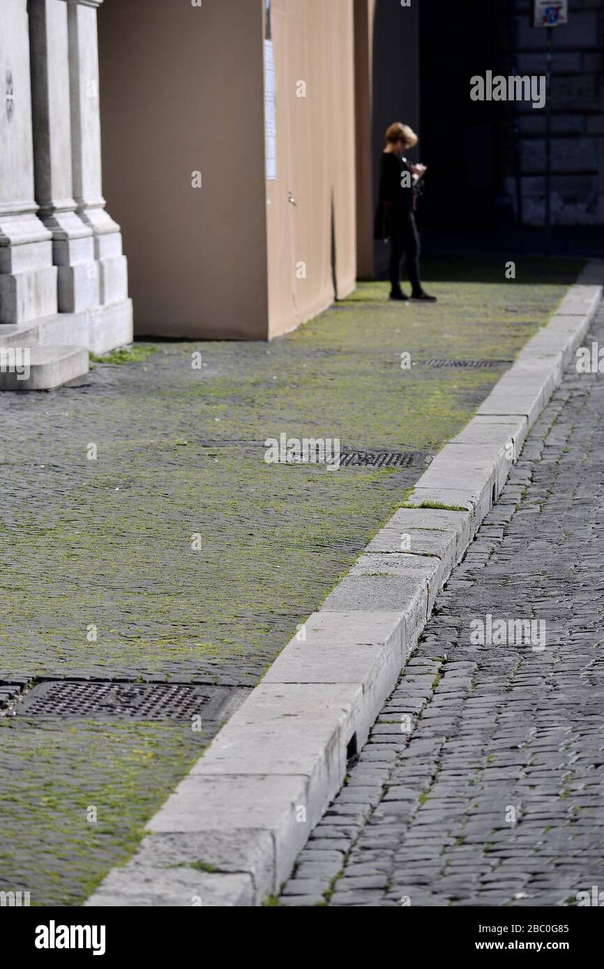 Rome, Piazza Navona looks like a green lawn, the grass grows among the ...