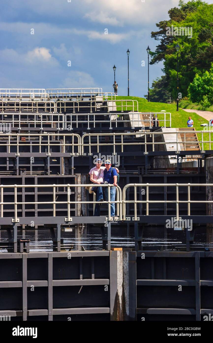 Neptune's staircase lock in Scotland with tourists Stock Photo - Alamy