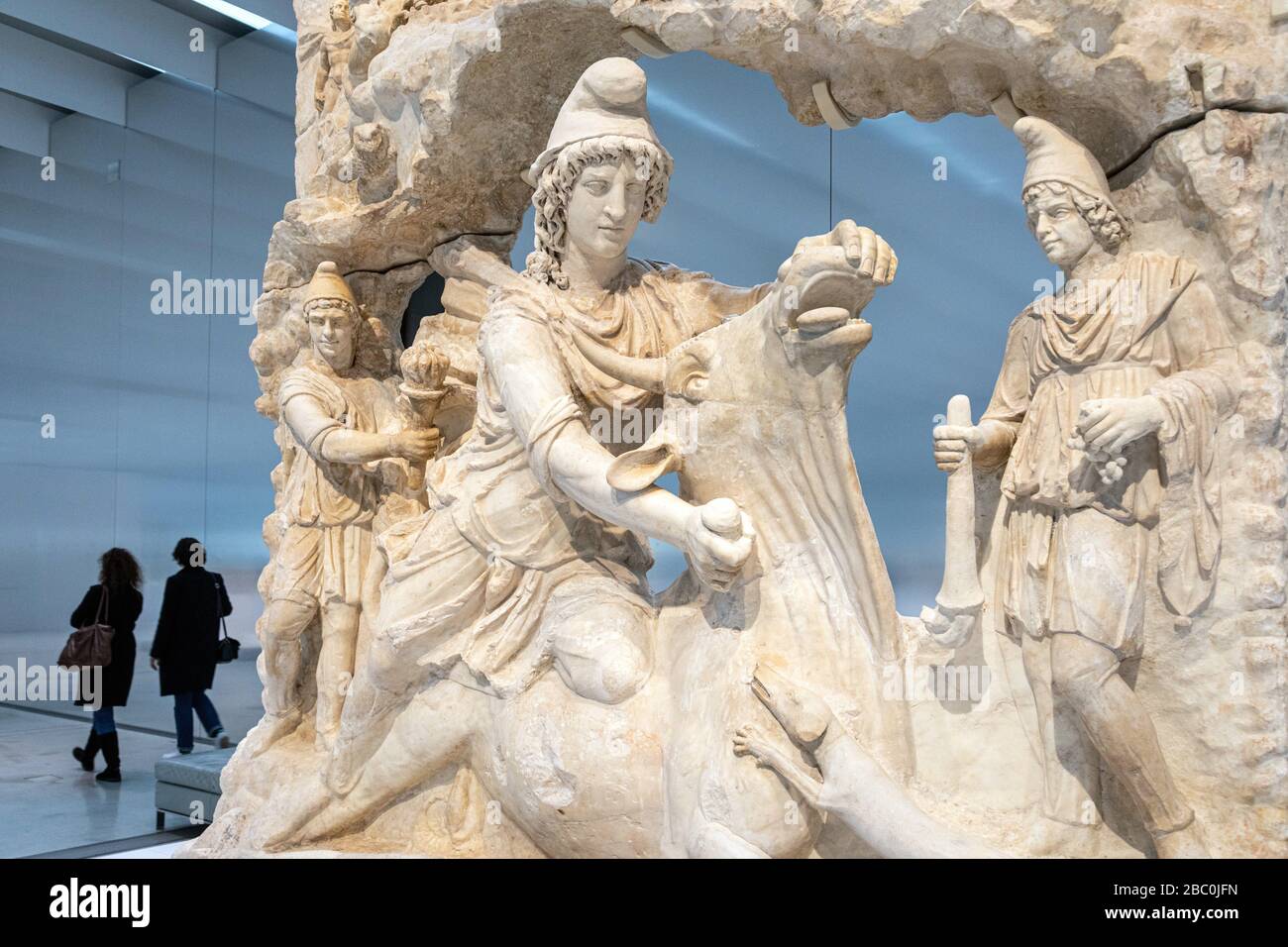 RELIEF REPRESENTING MITHRA, IRANIAN GOD OF THE SUN, SACRIFICING A BULL ...