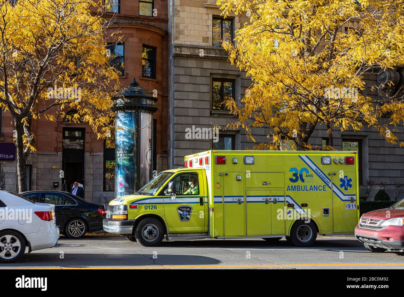 YELLOW PARAMEDIC'S AMBULANCE, EMERGENCY NUMBER 911, MONTREAL, QUEBEC ...