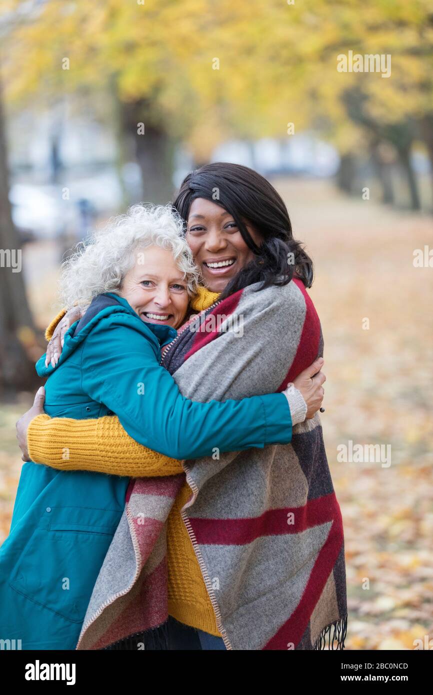 Indian two friends hugging smiling hi-res stock photography and images ...