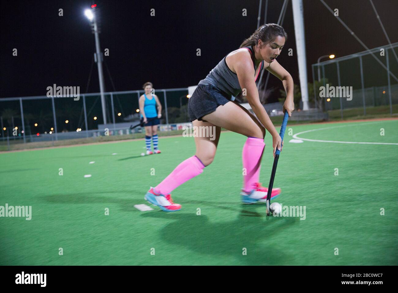 Girl playing field hockey hi-res stock photography and images - Alamy