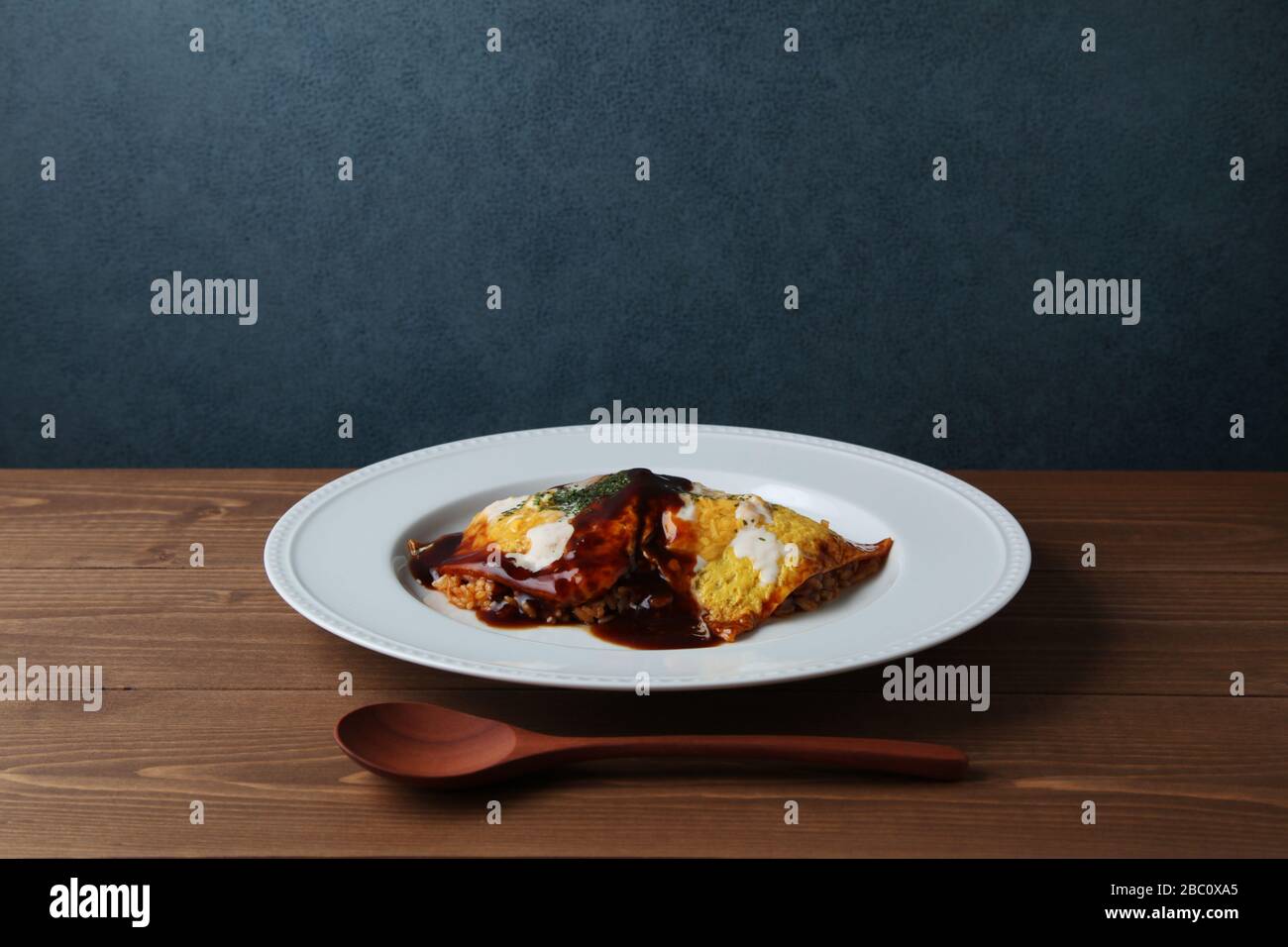 omuraisu omu rice omelet japanese food on plate isolated on table Stock ...