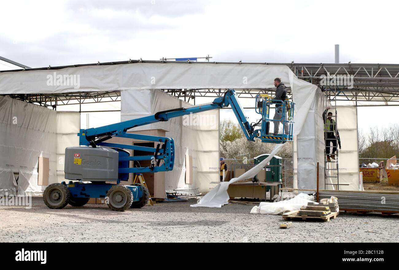 A view of a drive-thru COVID-19 screening site being constructed at ...