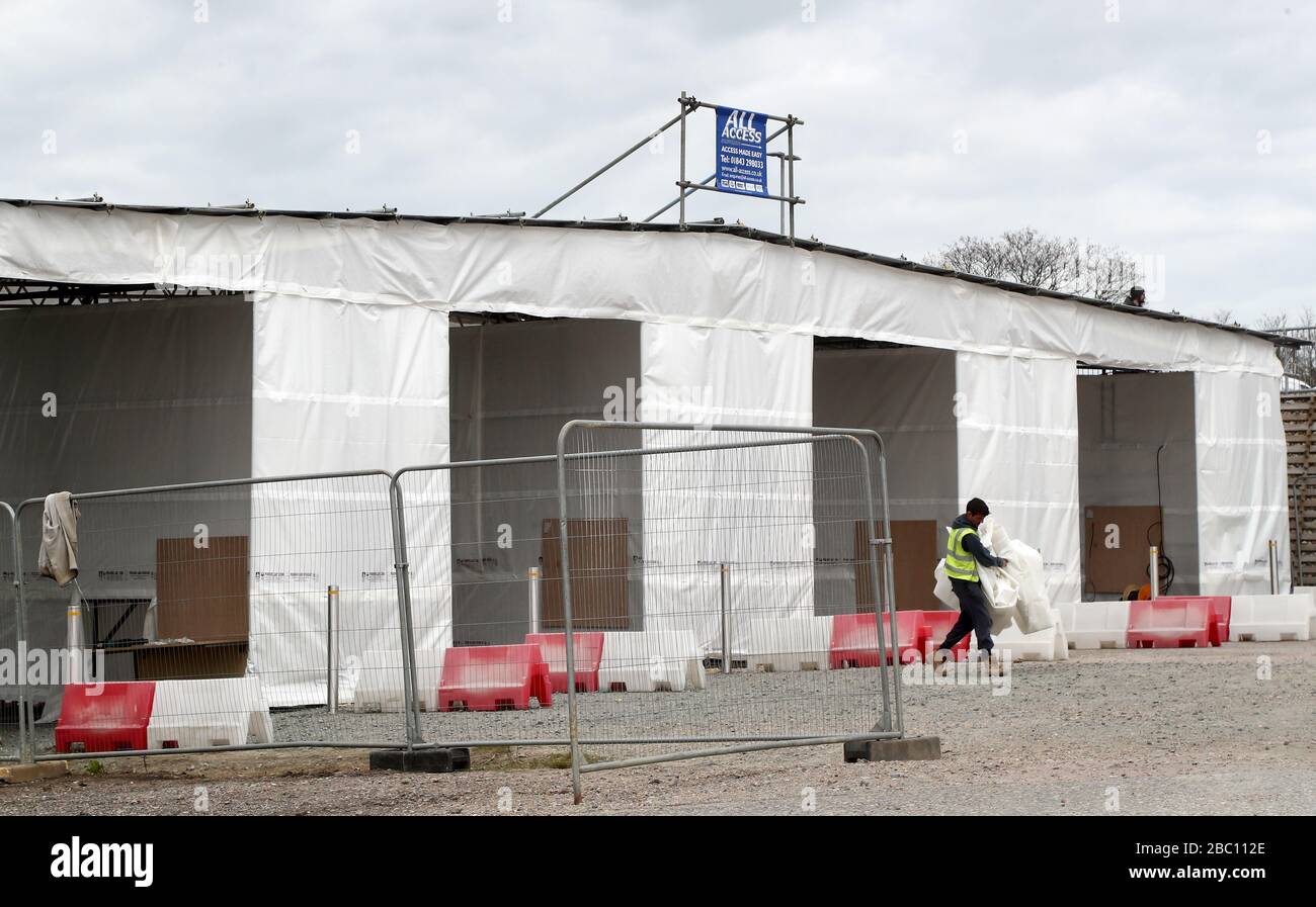 A view of a drive-thru COVID-19 screening site being constructed at ...