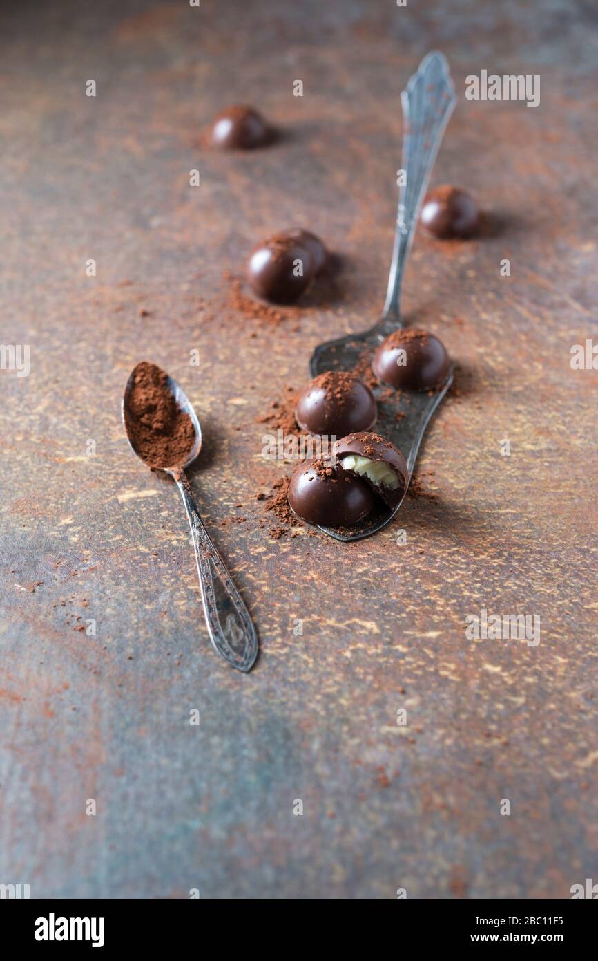 Chocolate pralines with vanilla filling Stock Photo - Alamy