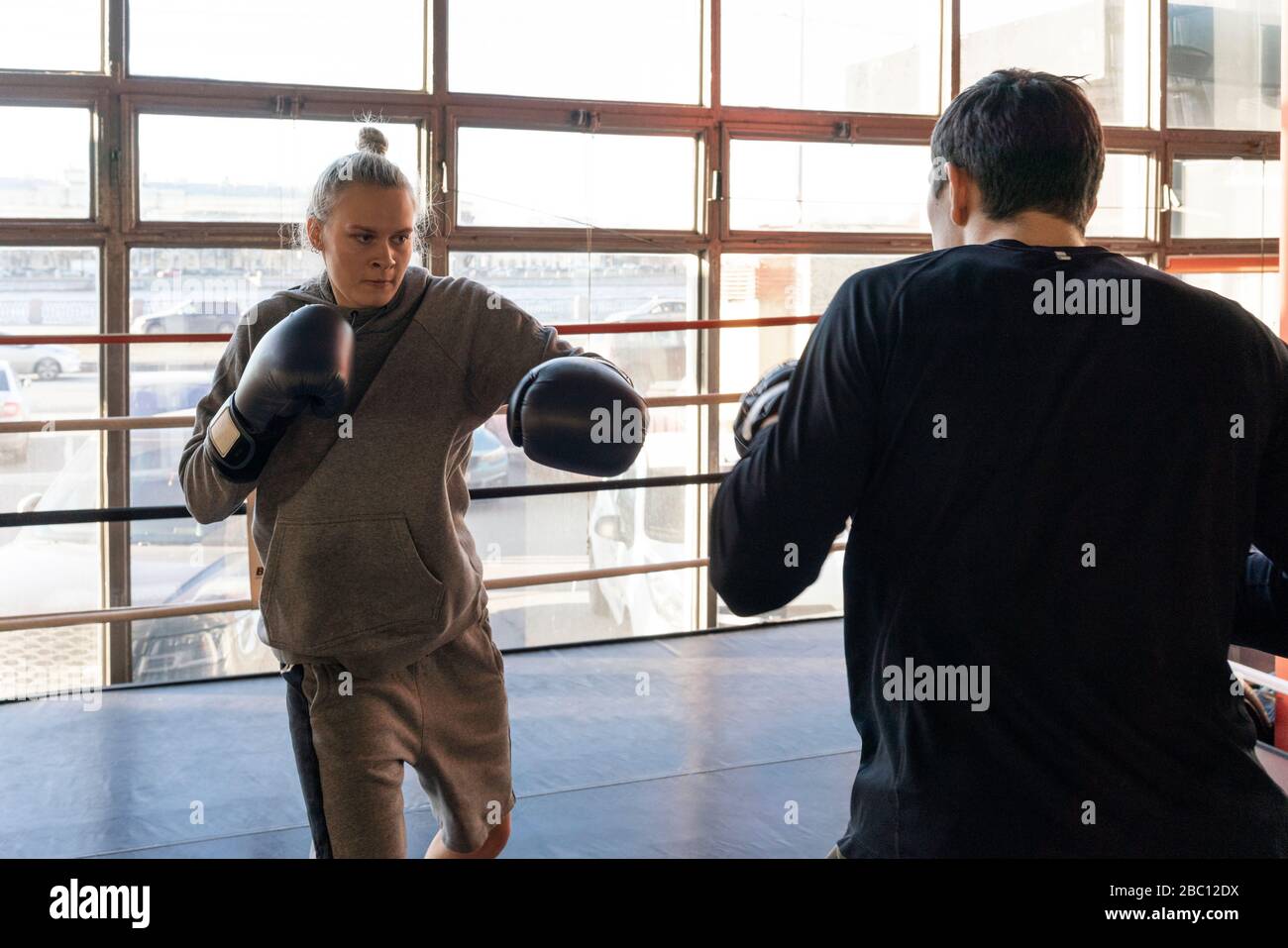 Female coach in gym hi-res stock photography and images - Alamy