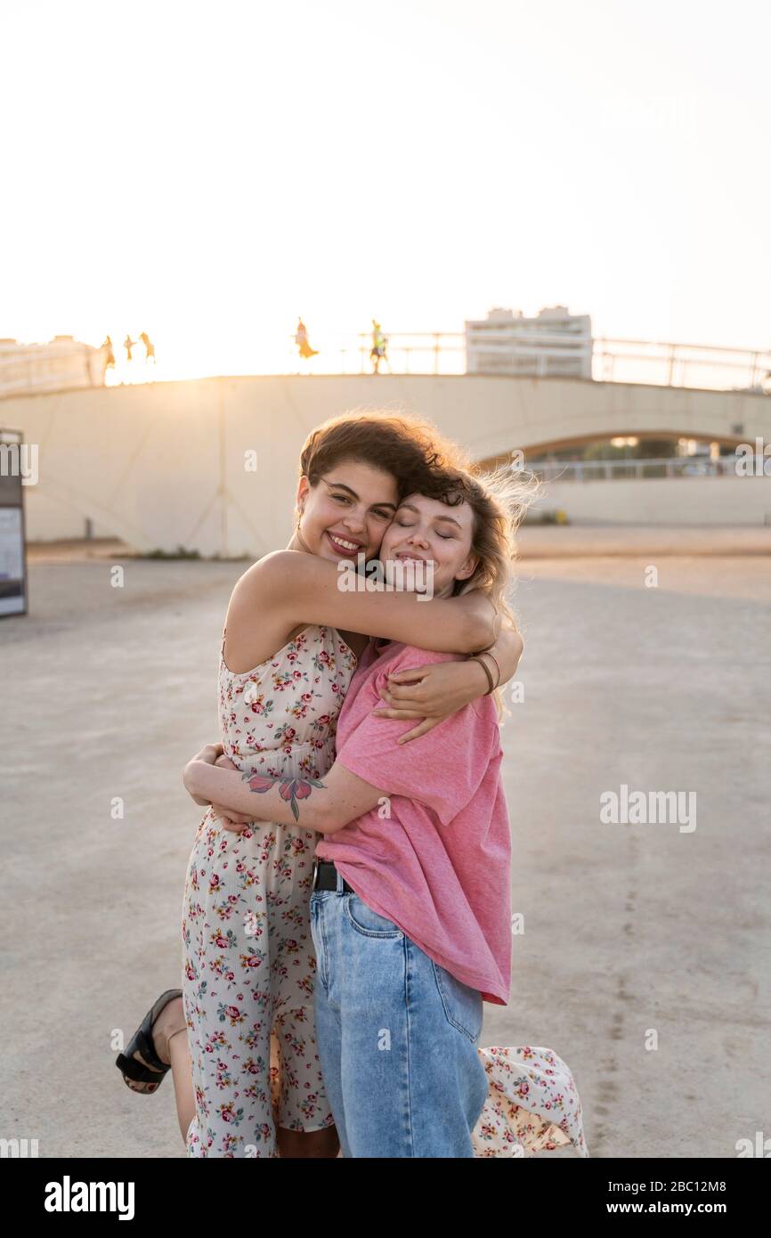 Body hugging hi-res stock photography and images - Alamy