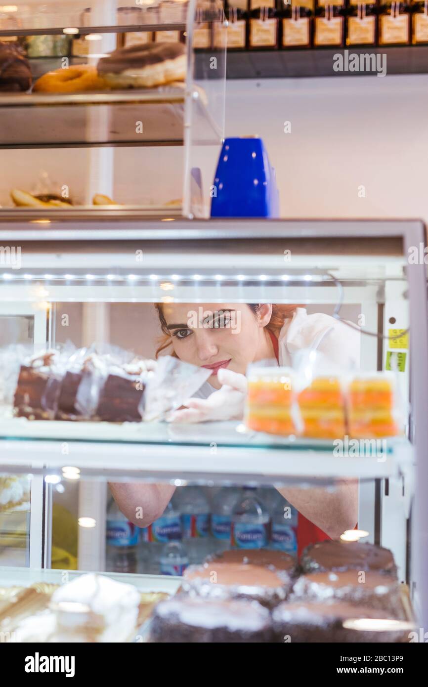 Woman bakery counter hi-res stock photography and images - Alamy