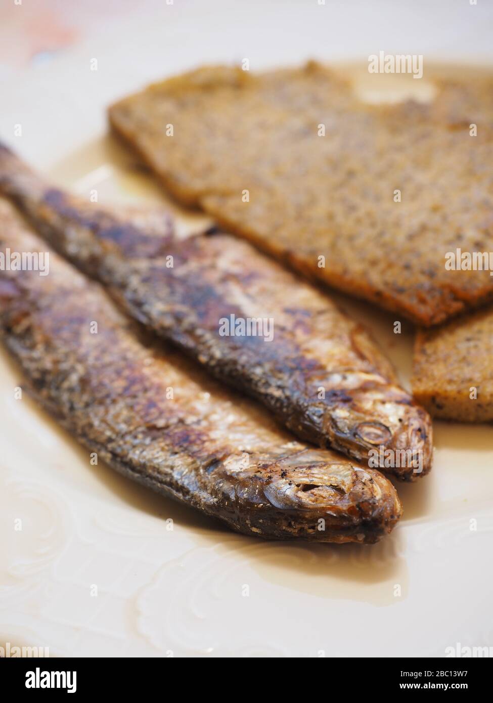 Missoltino con polenta, traditional dish, Varenna, Como Lakes, east ...