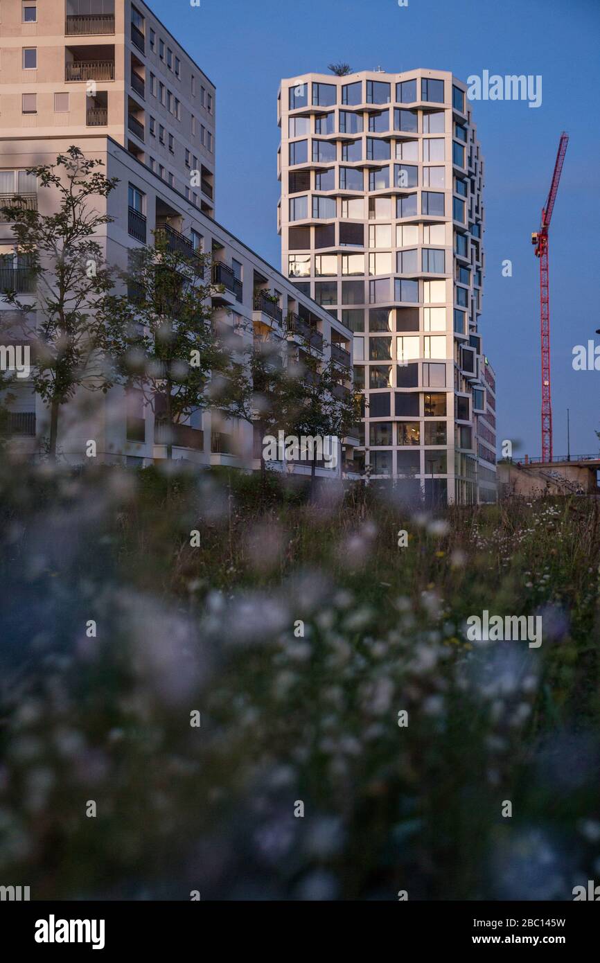 Modern high-rise residential building in the evening, Munich, Germany ...